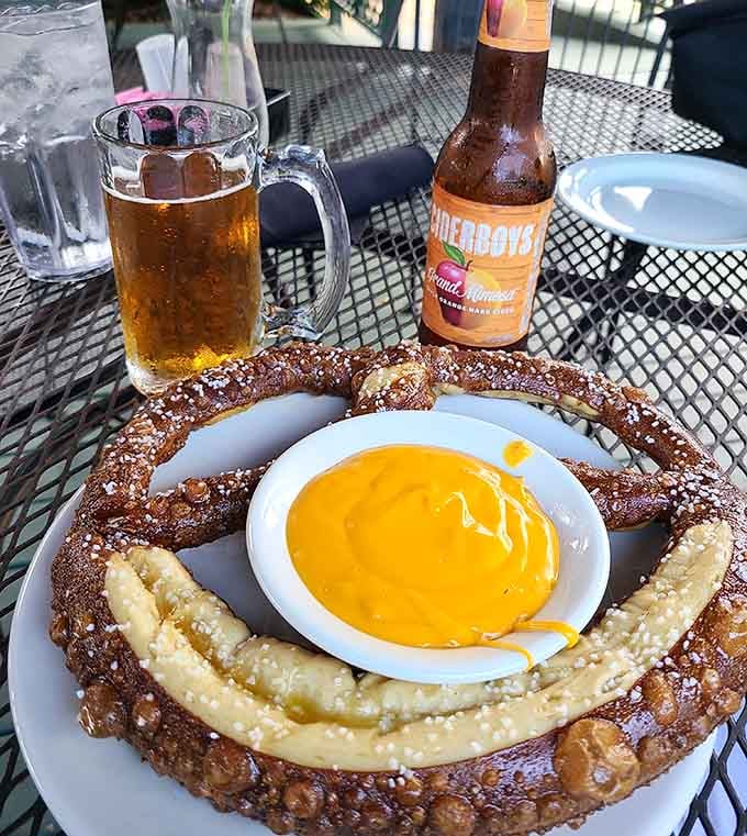 A giant pretzel with cheese dip and beer, the holy trinity of tavern dining that never goes out of style.
