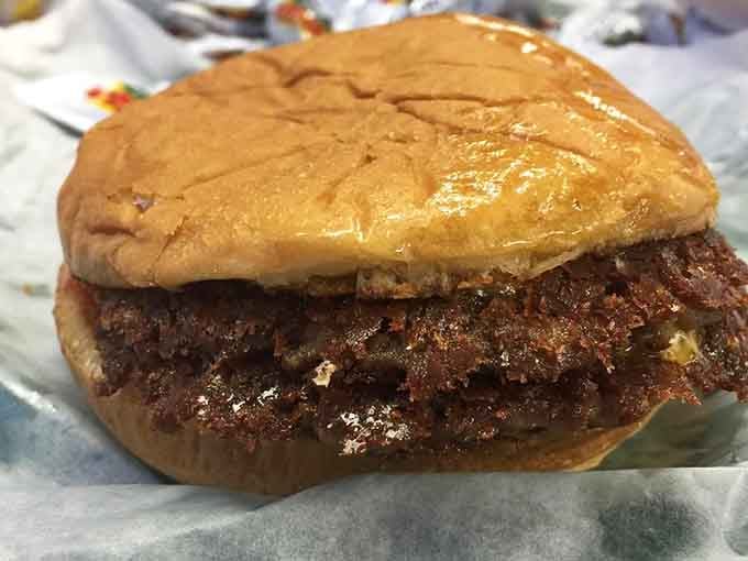 A glistening burger patty that thick deserves its own standing ovation and possibly a parade in its honor.