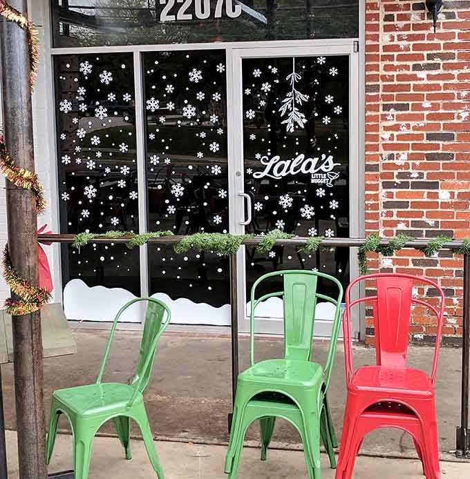Snowflake-covered windows in a state where real snow is basically a myth.