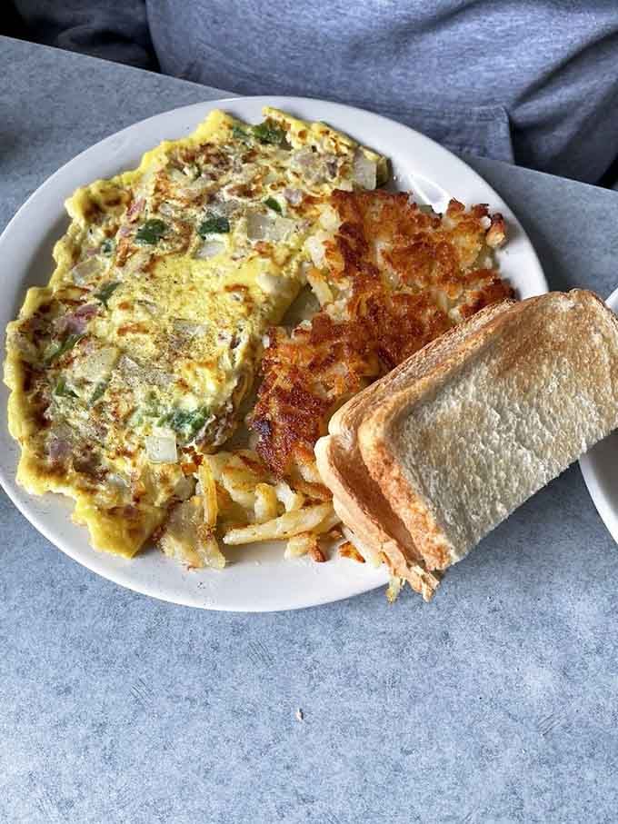 A Western omelette loaded with ham, peppers, and onions, bringing cowboy breakfast vibes to Pennsylvania mornings successfully.