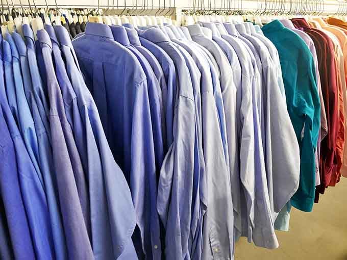 The dress shirt section: where business casual meets bargain hunter's paradise. That perfect interview shirt is waiting here, no second mortgage required.