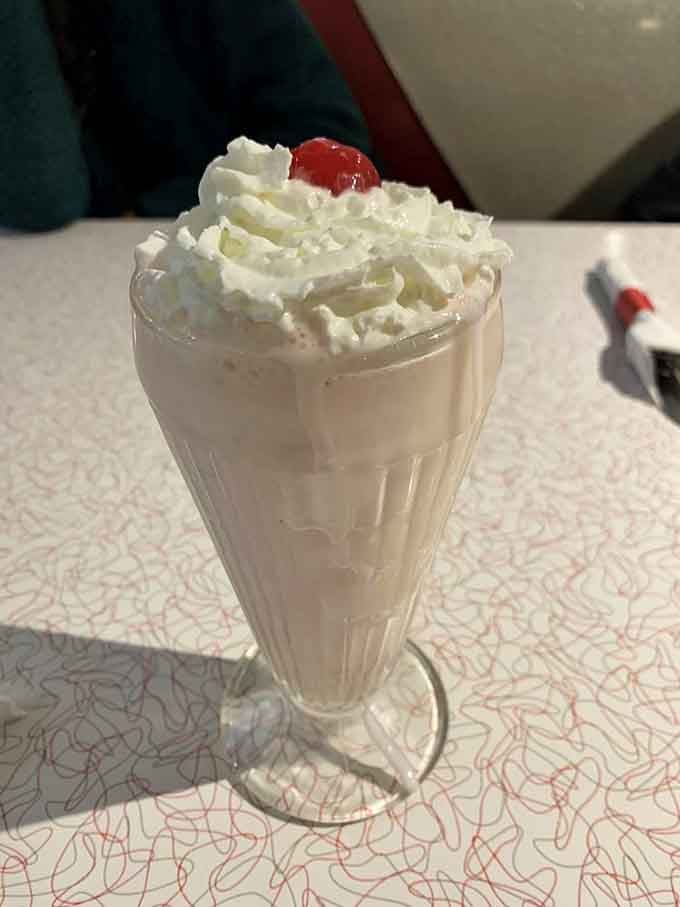That classic milkshake topped with whipped cream and a cherry is basically childhood happiness served in a glass.