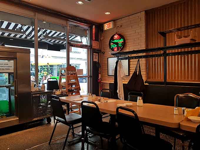 The exit view reveals a classic diner layout where efficiency meets comfort, and nobody leaves hungry or disappointed.