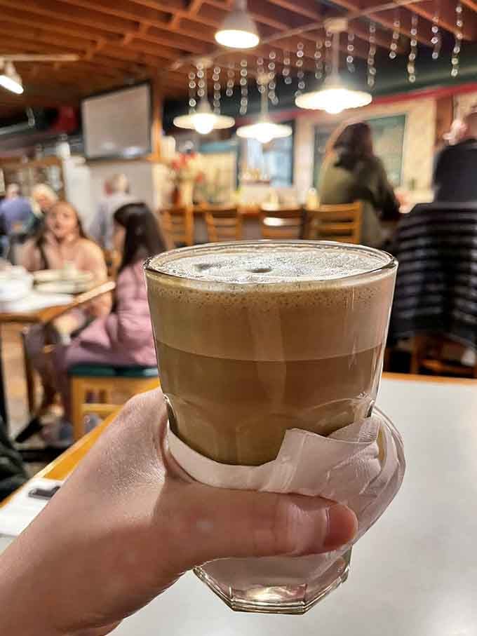 A perfectly layered latte that looks almost too pretty to drink, but you'll manage somehow, trust me.