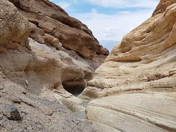 Mosaic Canyon's polished marble walls offer a completely different adventure just minutes from the sandy main attraction.
