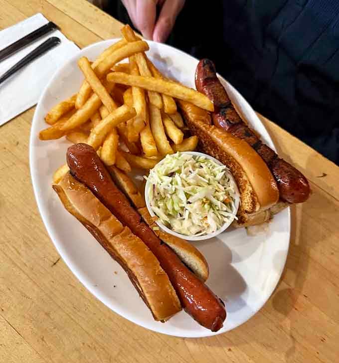 Hot dogs and coleslaw proving this cottage serves more than just its famous burgers, though why would you?
