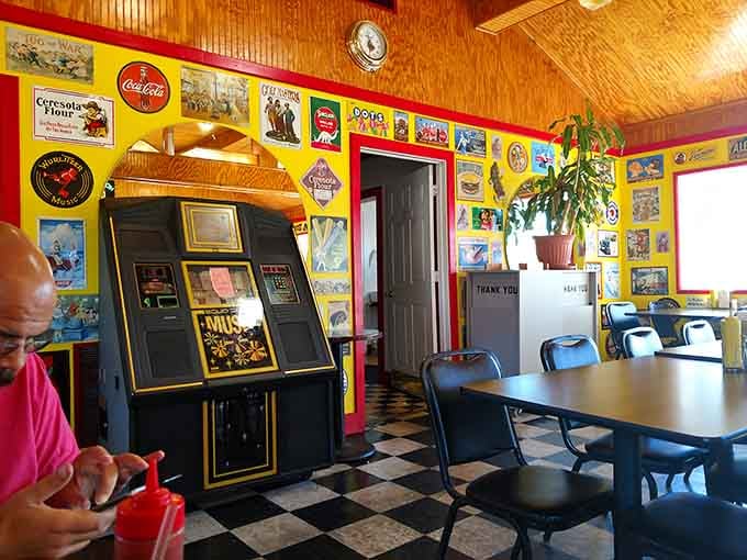 That vintage arcade game in the corner isn't just decoration, it's a reminder that entertainment used to require actual quarters.