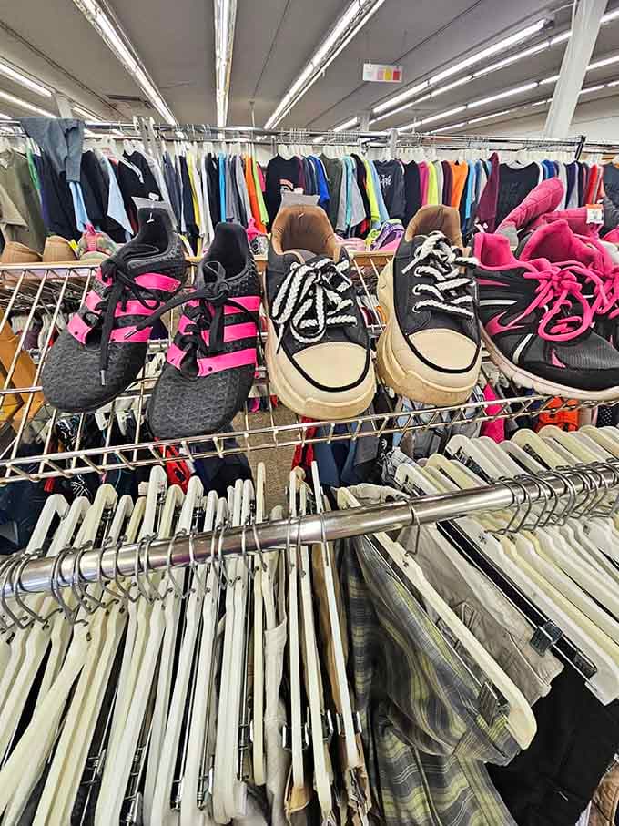 Shoes organized by color create a rainbow of footwear possibilities, from sneakers to dress shoes and everything between.