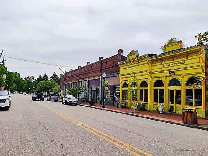 That bright yellow facade practically glows with cheerful hospitality, impossible to miss or forget on any street.