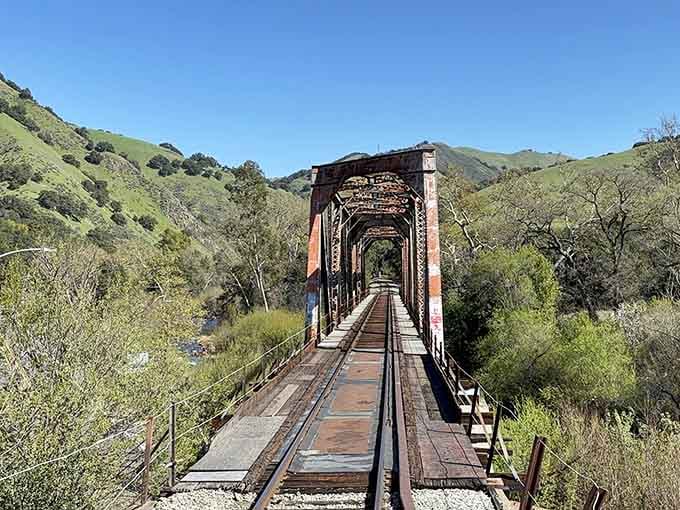 This historic trestle bridge adds drama to your journey, spanning the creek like something from a classic Western film.