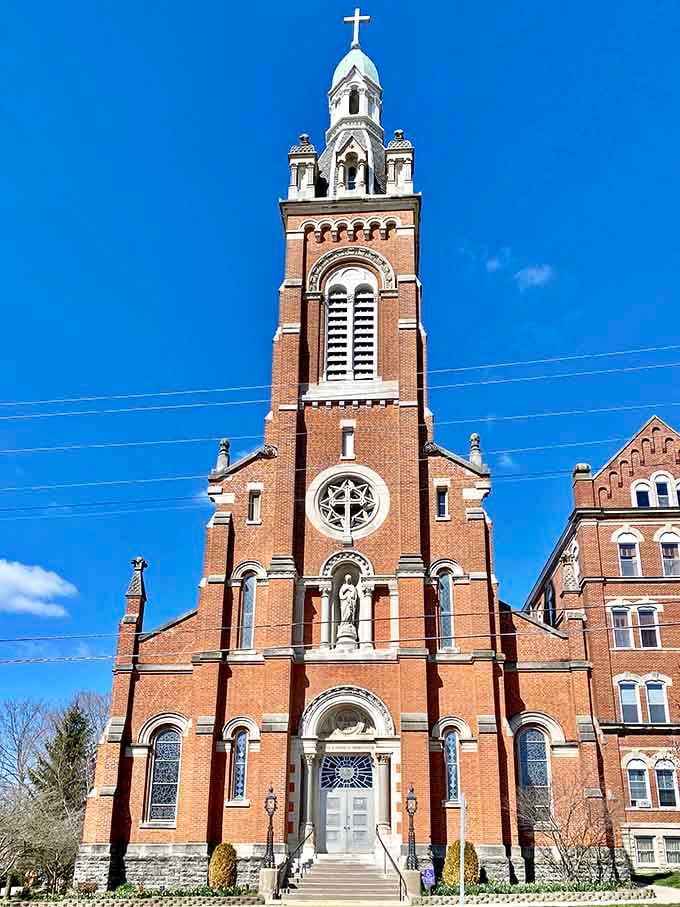 Immaculate Conception Convent's towering spire dominates the skyline like a Gothic Revival exclamation point declaring "We're here!"