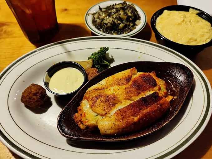When your fish arrives in a skillet with a hushpuppy, you know someone in the kitchen understands priorities.