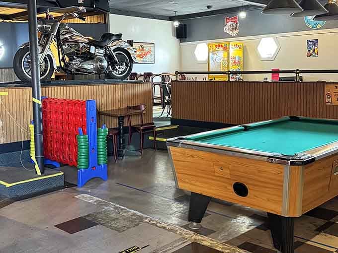 Sometimes the best small-town hangouts hide behind unassuming doors with motorcycles mounted on the walls inside.