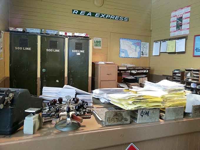 The REA Express office looks frozen in time, complete with paperwork and equipment from when shipping meant something entirely different.