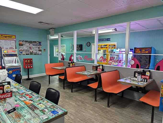 Bright booths and arcade games add a playful touch, because who says diners can't have a little extra fun?