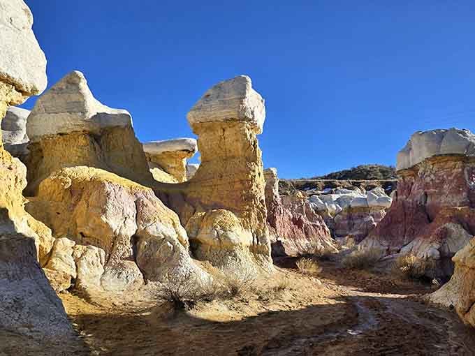 Sunshine illuminates the striped formations, making you wonder if Earth borrowed its color scheme from a sunset painting.
