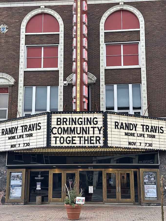The Paramount Theater's marquee promises community entertainment at prices that actually feel like entertainment, not punishment.