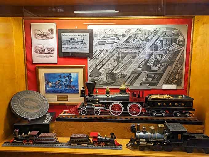 Model trains wind through miniature landscapes, delighting the kid in everyone who walks past this display.