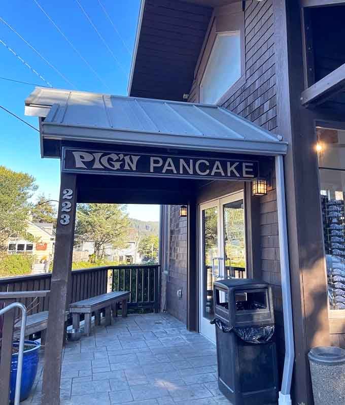 The entrance welcomes you with that classic coastal charm, promising warmth and pancakes just beyond those doors.