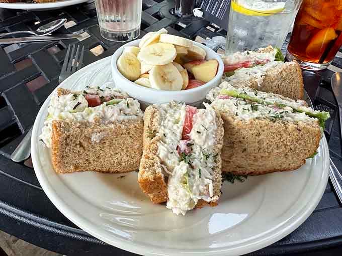 That chicken salad sandwich piled high with grapes and nuts looks like lunch decided to throw itself a party.