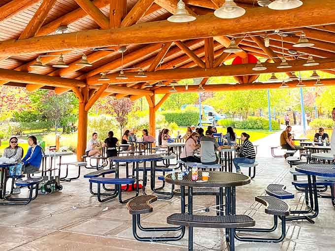 Gorgeous timber pavilion offers shaded respite where families can refuel between rounds of energetic play.