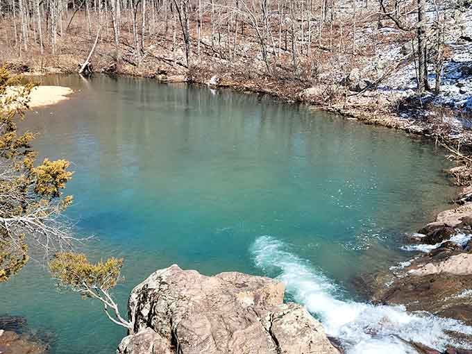 That turquoise pool looks like something from a tropical postcard, but it's pure Missouri magic.