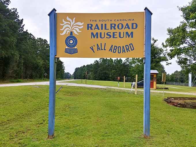 Y'all aboard indeed, because this cheerful sign promises exactly the kind of nostalgic adventure your Saturday afternoon desperately needs.