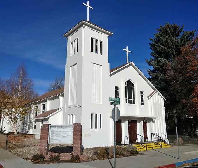 White steeples against blue skies create postcard moments that don't require Instagram filters to look good.