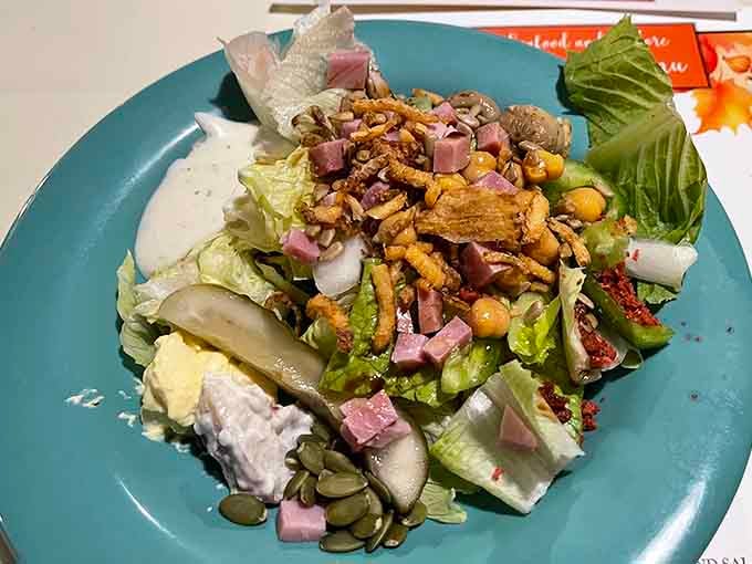 A salad that proves vegetables can hold their own at a seafood joint. Fresh, colorful, and substantial enough to make even dedicated carnivores pause their lobster pursuit.