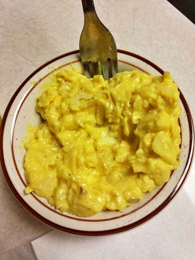 Mac and cheese that glows with the intensity of a thousand suns. This isn't just comfort food&mdash;it's a warm hug for your taste buds.