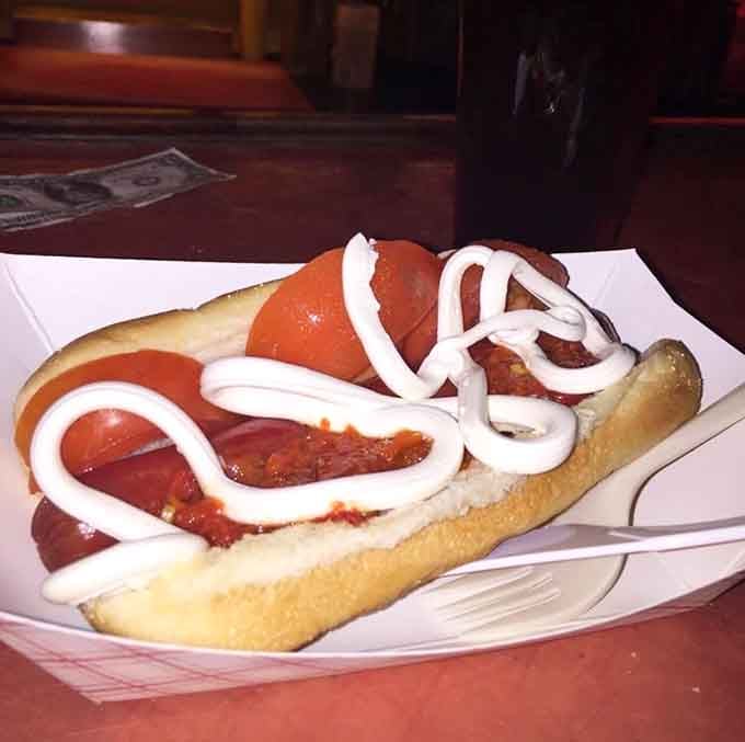 The Seattle dog shows local pride with every bite, combining regional flavors into one glorious handheld creation.