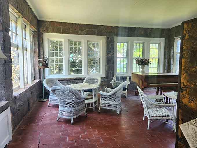 White wicker furniture and river views, because castles need their relaxation spaces too.