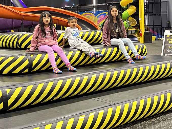 Striped like a bumblebee's nightmare, these cushioned steps are where tired parents rest between slide runs.