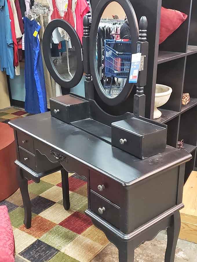 This sleek black vanity with triple mirrors makes getting ready feel like a Hollywood dressing room.