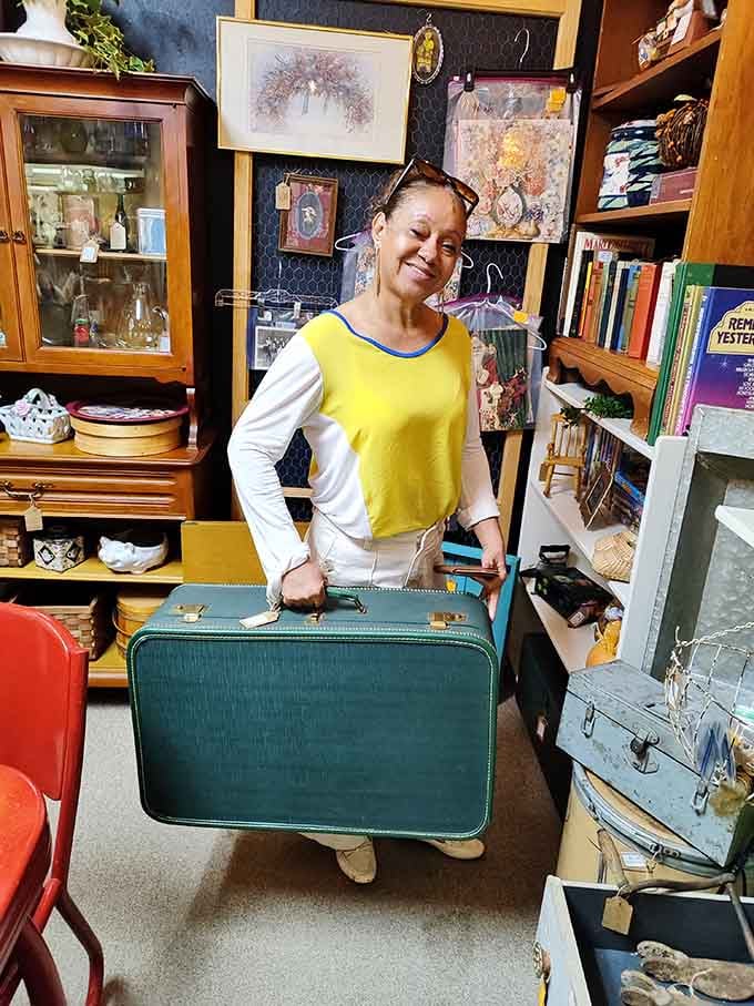 That smile says it all: she just found the perfect vintage suitcase for her next adventure or display.