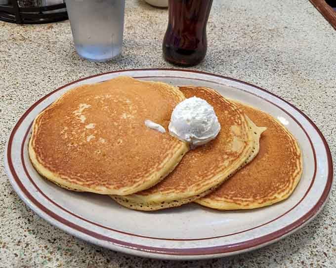 Buttermilk cornmeal pancakes that understand the assignment and then exceed all reasonable expectations for breakfast carbs.