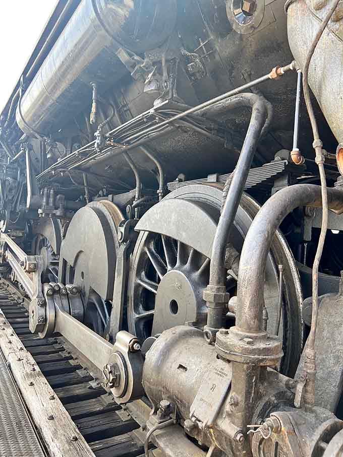 The massive drive wheels and intricate mechanisms reveal engineering genius from an era before computers solved every problem.