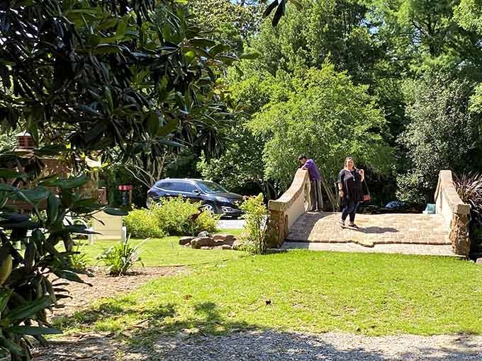 Visitors crossing that whimsical bridge discover that fairy tales can have Alabama zip codes after all.