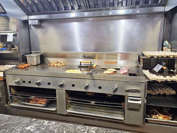 The kitchen where skilled hands turn simple ingredients into the breakfast dreams that keep locals coming back.