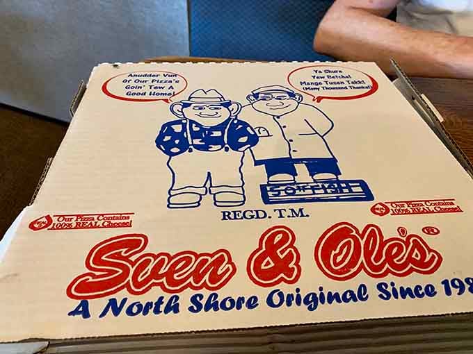 The pizza box featuring Sven and Ole themselves, ready to travel home with you for round two.