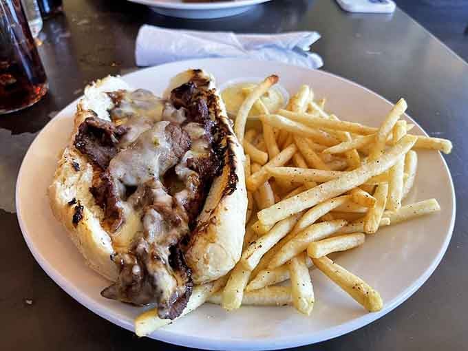 The buffalo teriyaki steak sandwich with melted cheese demonstrates how creative flavors can elevate classic comfort food.