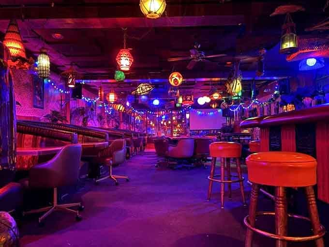 Purple lighting and bar stools create the kind of atmosphere where karaoke dreams are born and nurtured.