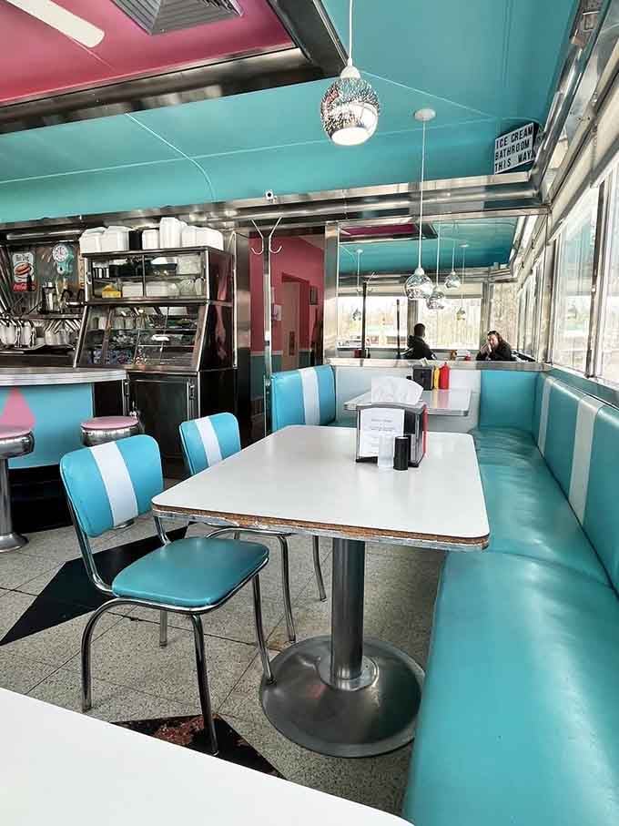 That counter stretches invitingly, lined with swivel stools just begging you to spin once for good luck.