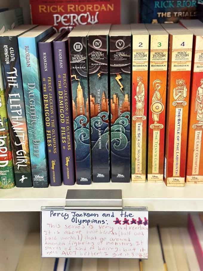 Percy Jackson fans rejoice: the entire series lined up like Greek columns, complete with enthusiastic handwritten recommendations.