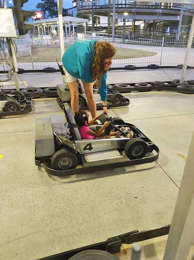 Helping little ones into their racing machines is a rite of passage that never gets old, no matter how many times you do it.