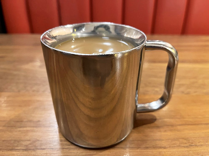 Diner coffee in a classic metal mug&mdash;simple, strong, and refilled before you even ask for more.