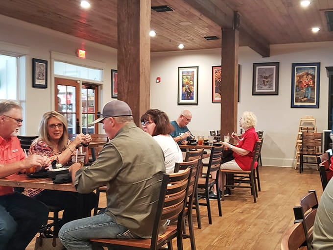 Diners settle in at wooden tables where countless seafood feasts have created memories and loosened belt buckles.