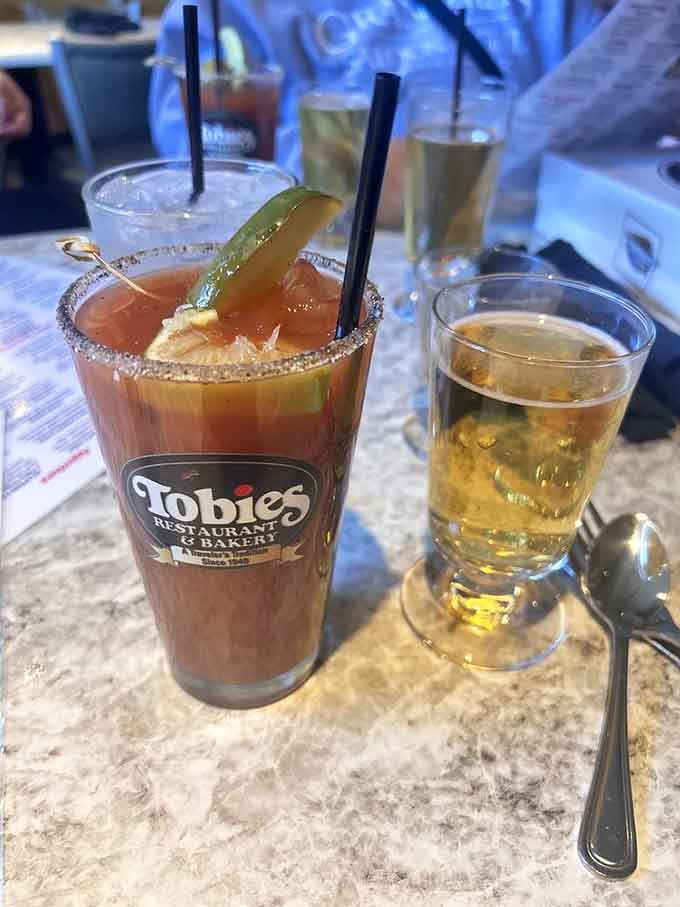 A Bloody Mary garnished with enough personality to qualify as its own meal entirely.