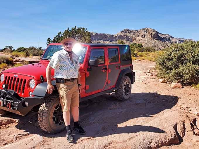 That smile says it all&mdash;you've just conquered sixty miles of dirt road for a view that defies description.