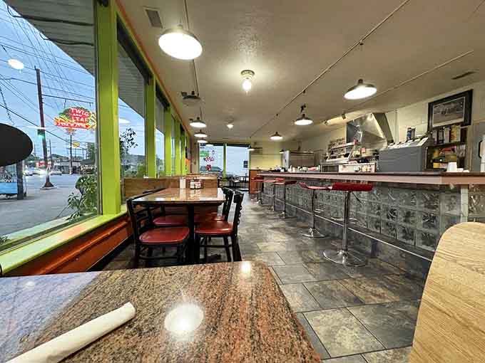 The dining area stretches invitingly, offering plenty of space to settle in and enjoy your meal properly.